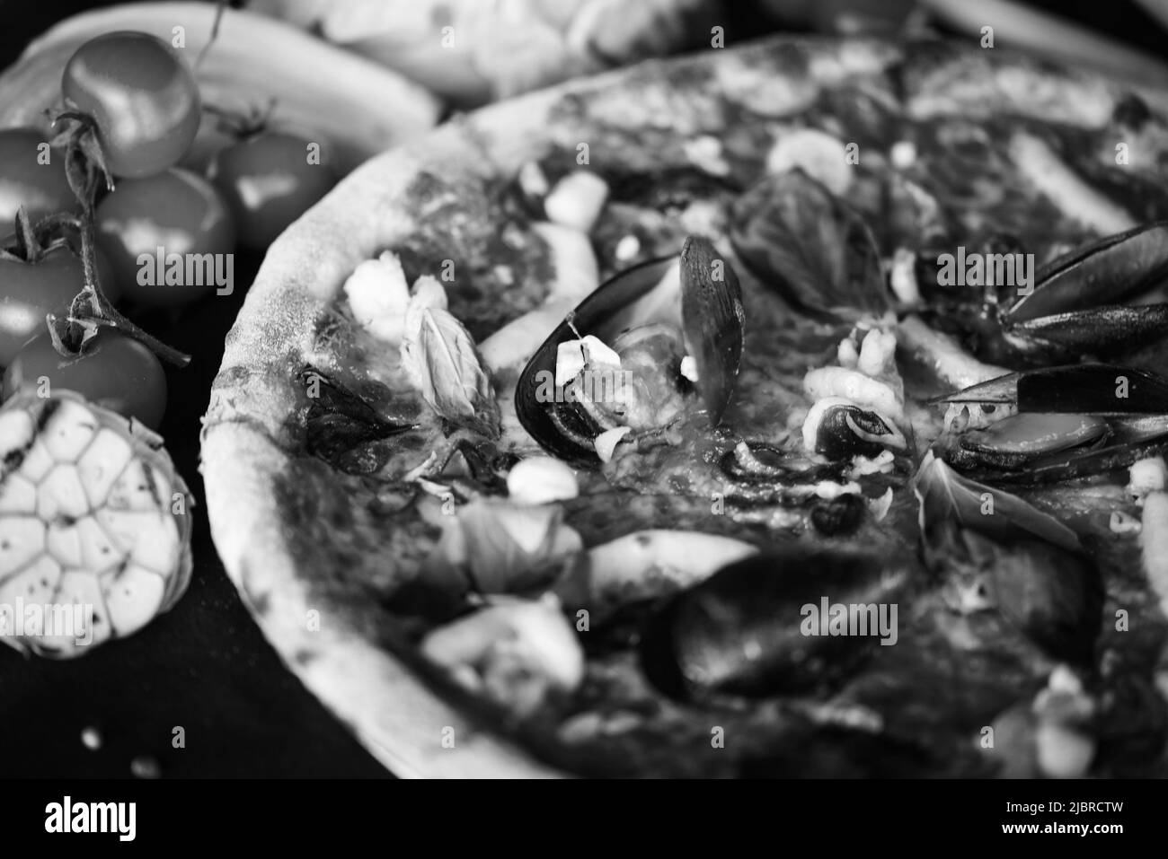 Tasty gourmet italian pizza Black and White Stock Photos & Images - Alamy