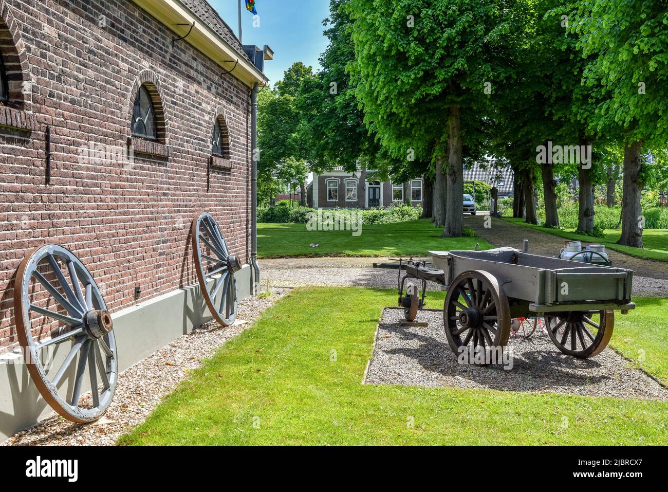 Beemster, Netherlands, May 2022. A traditional farm with old agricultural tools. High quality ...
