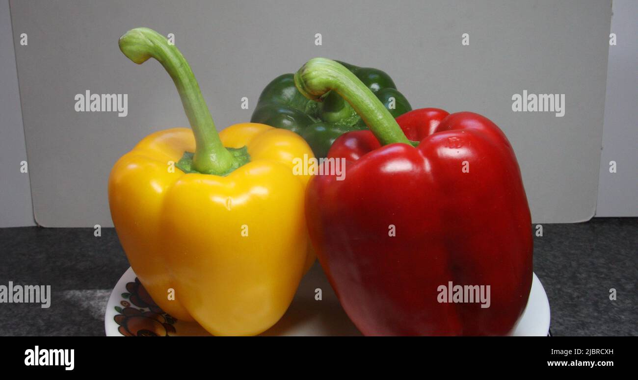 Rotating red green yellow peppers hi-res stock photography and images ...