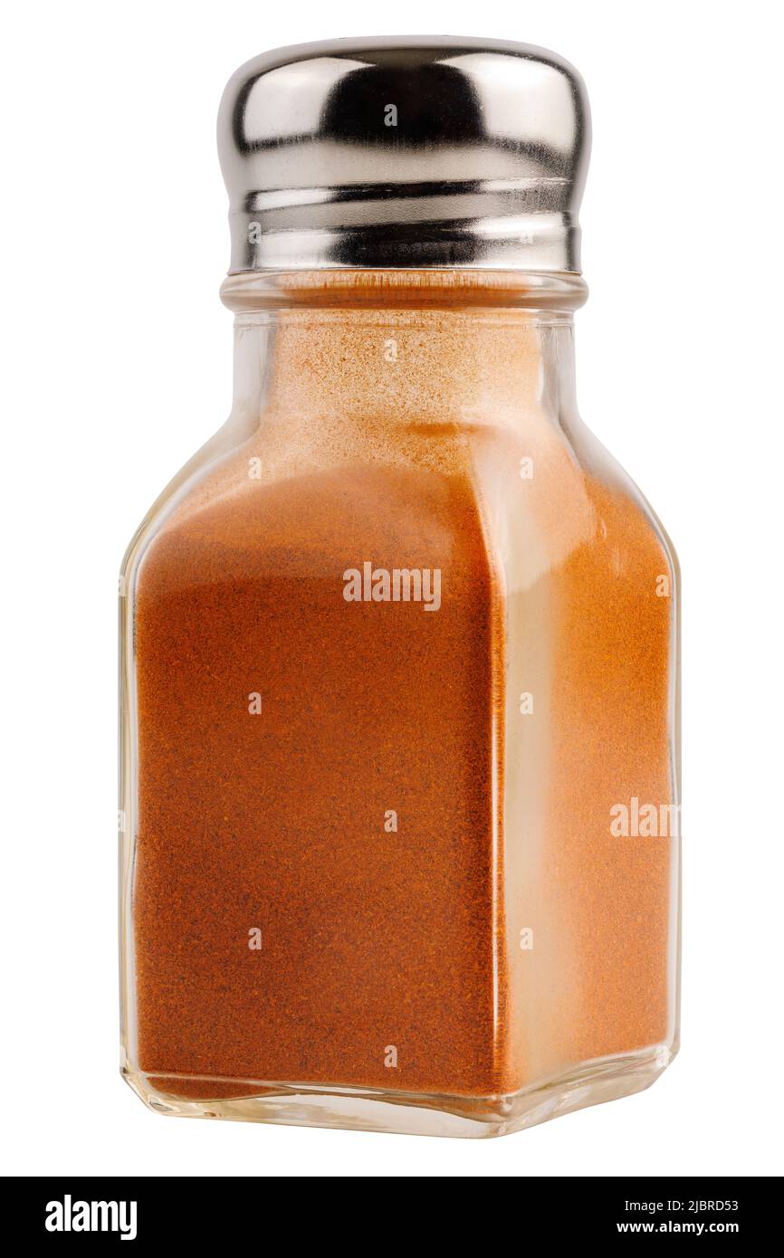 glass pepper pot with ground red paprika pepper isolated on white ...