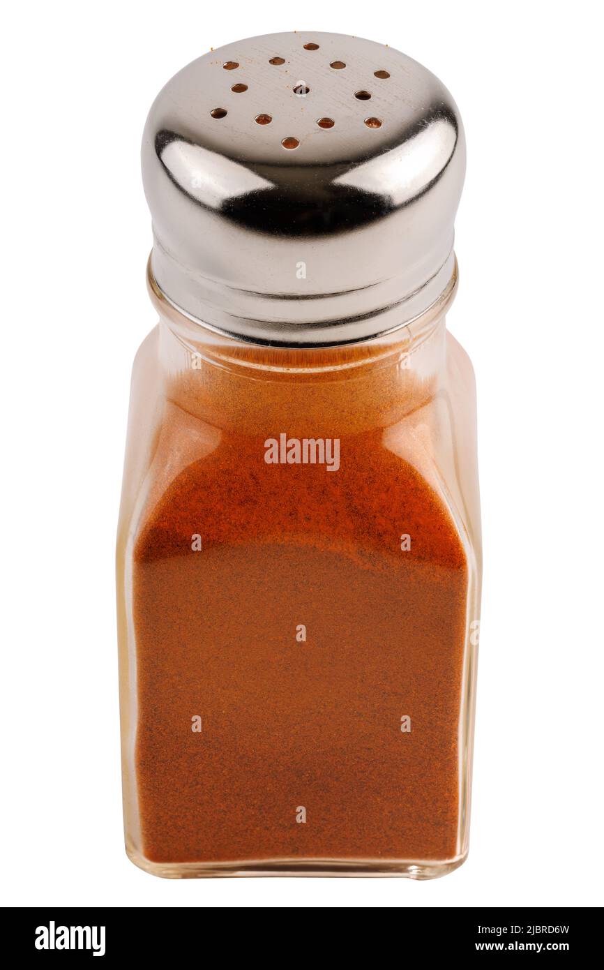 glass pepper pot with ground red paprika pepper isolated on white ...