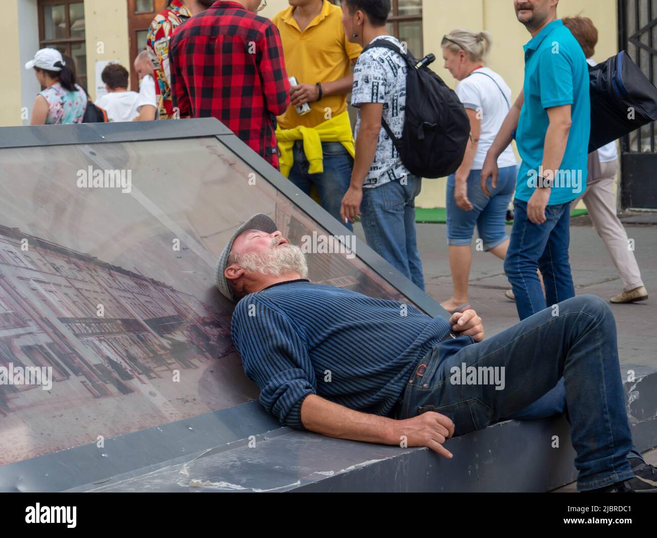 Kazan, Russia. 08.21. 2021 . bearded man sleeping on the street. Tired ...