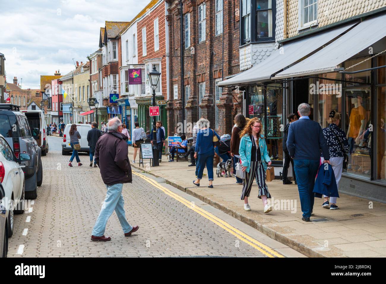 Rye high street, visitors walking in the town centre, shops, east ...