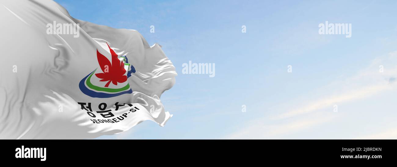 official flag of Jeongeup city, South Korea at cloudy sky background on ...