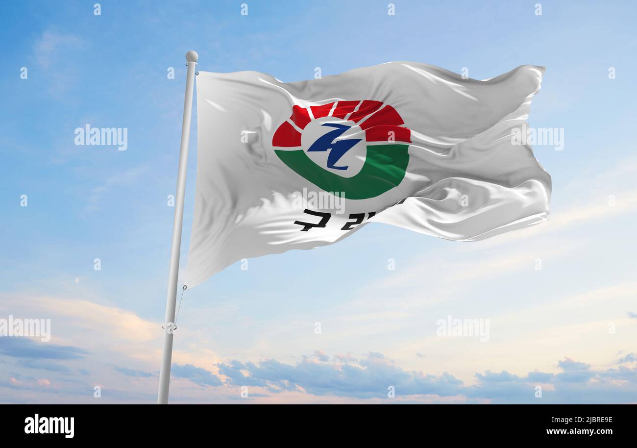 official flag of Guri city, South Korea at cloudy sky background on ...