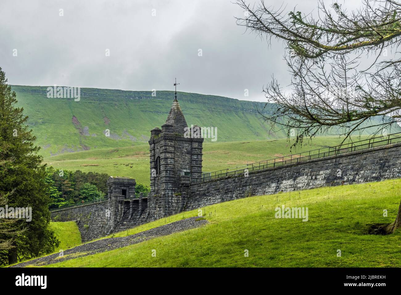 The dam and tower at the Upper Neuadd Reservoir after the reservoir had ...