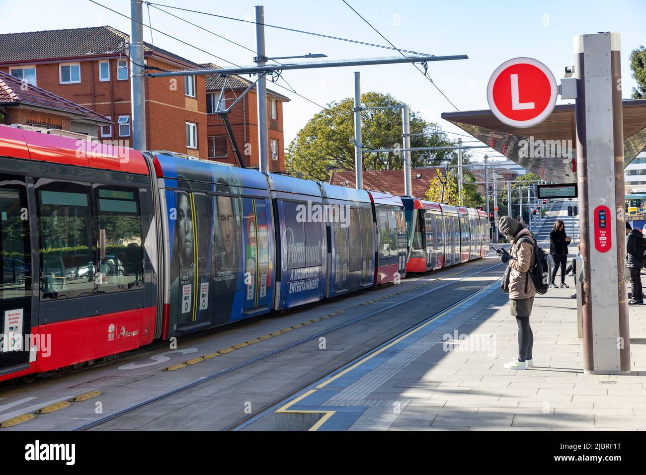 Sydney light rail train stops at UNSW High street station near UNSW ...