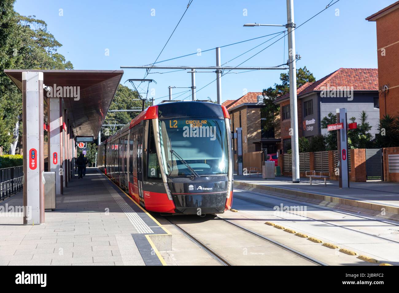 Sydney light rail train stops at UNSW High street station near UNSW ...