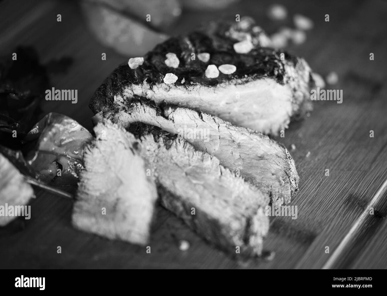Closeup grilled steak on grill Black and White Stock Photos & Images ...