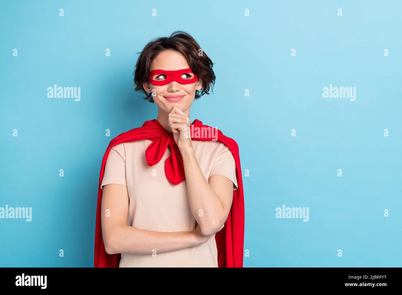 Photo of adorable dreamy woman wear red cape smiling arm chin looking ...