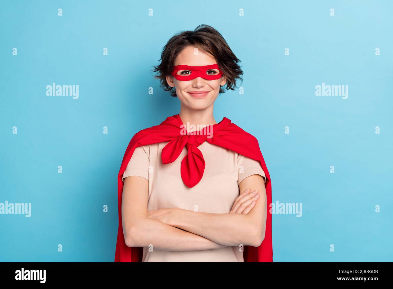 Photo of sweet adorable woman wear red cape smiling arms folded ...