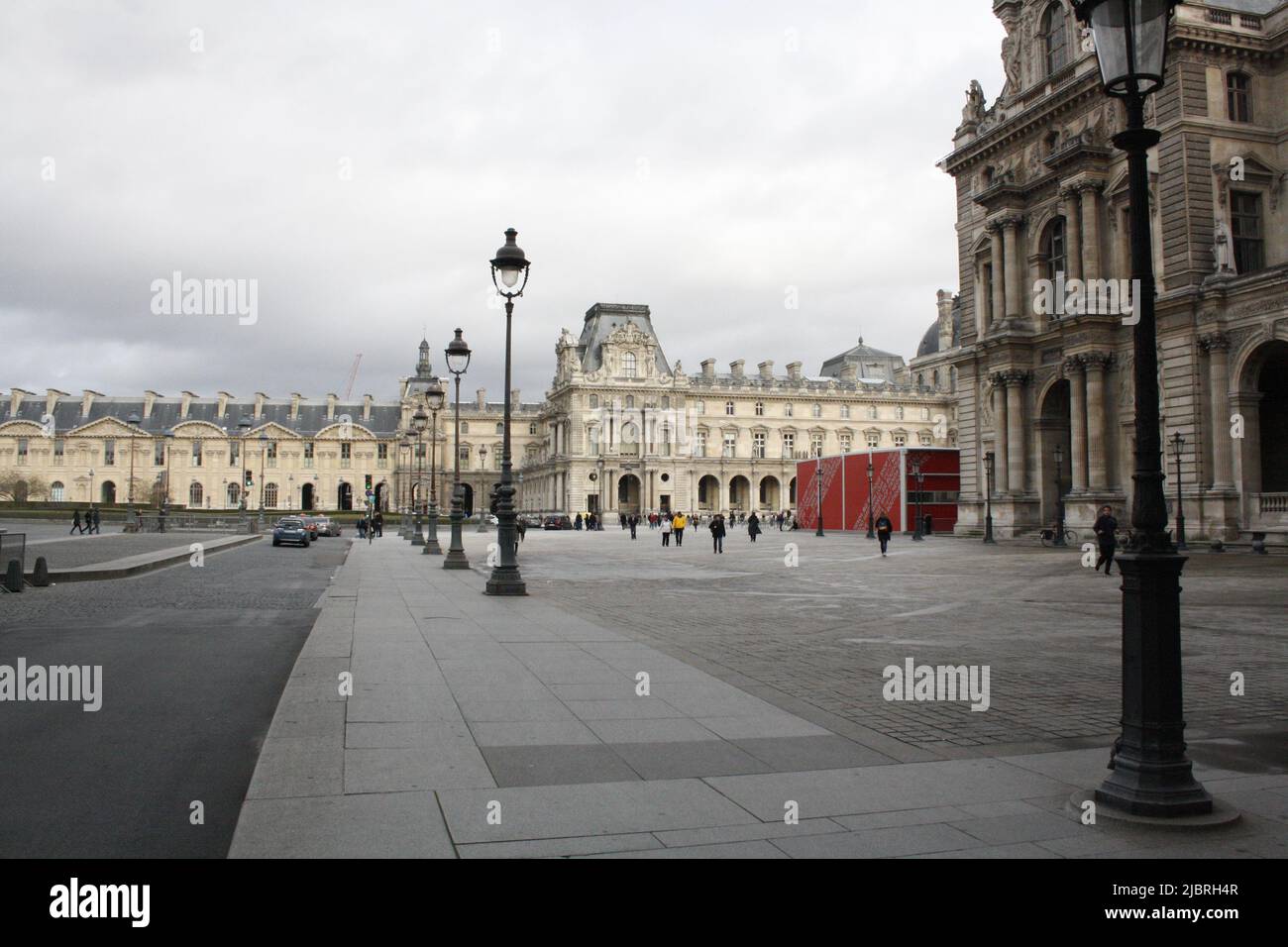 Entering the main gateway to the Louvre Stock Photo - Alamy