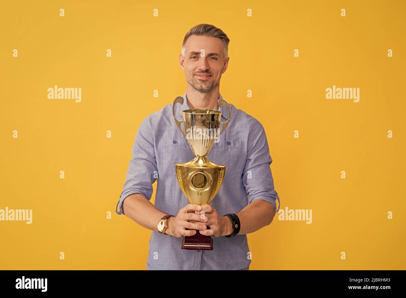 motivation of business success. trophy and prestige. got prize. guy ...