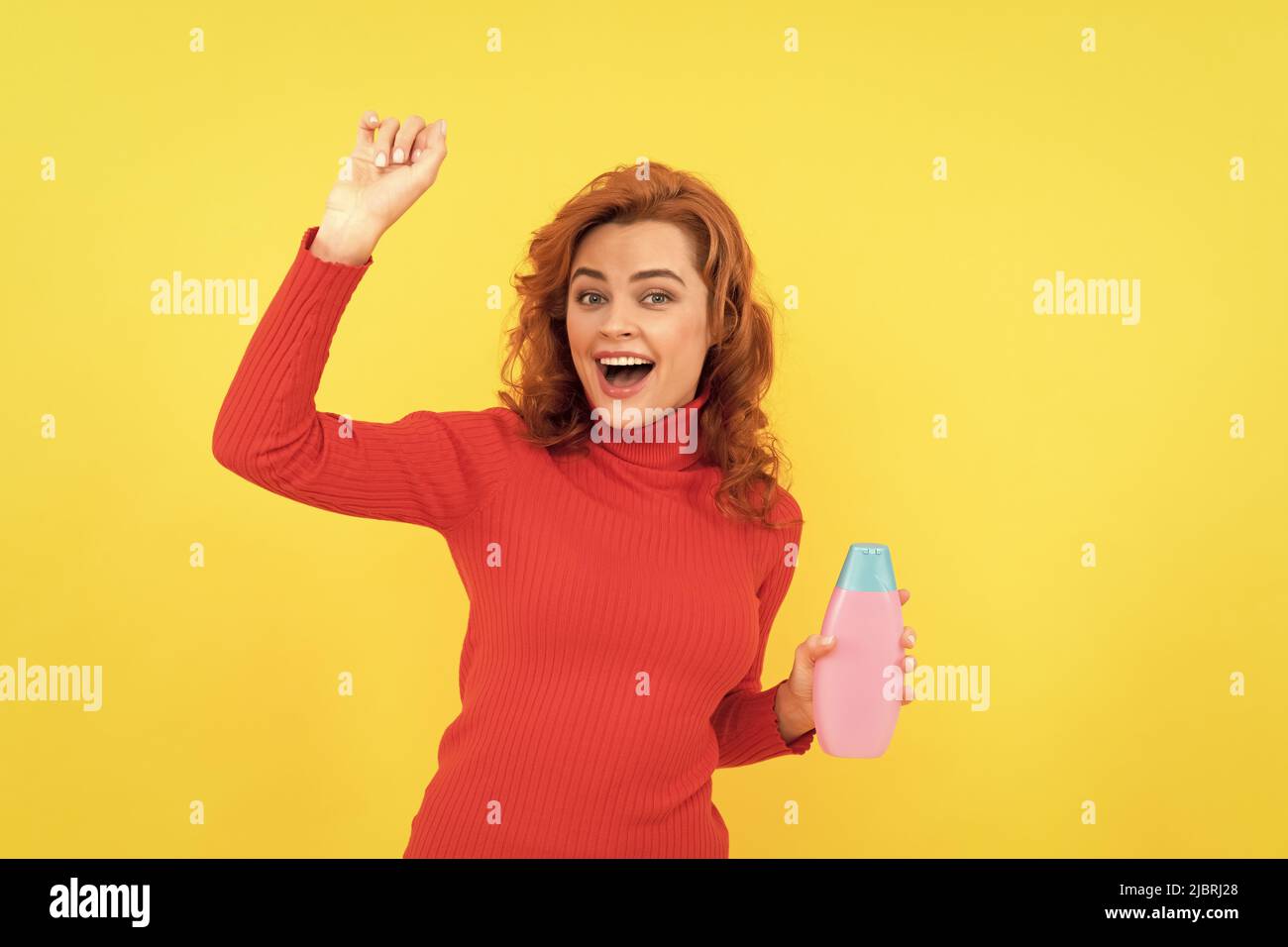 beauty product. daily habits and personal care. redhead lady presenting ...