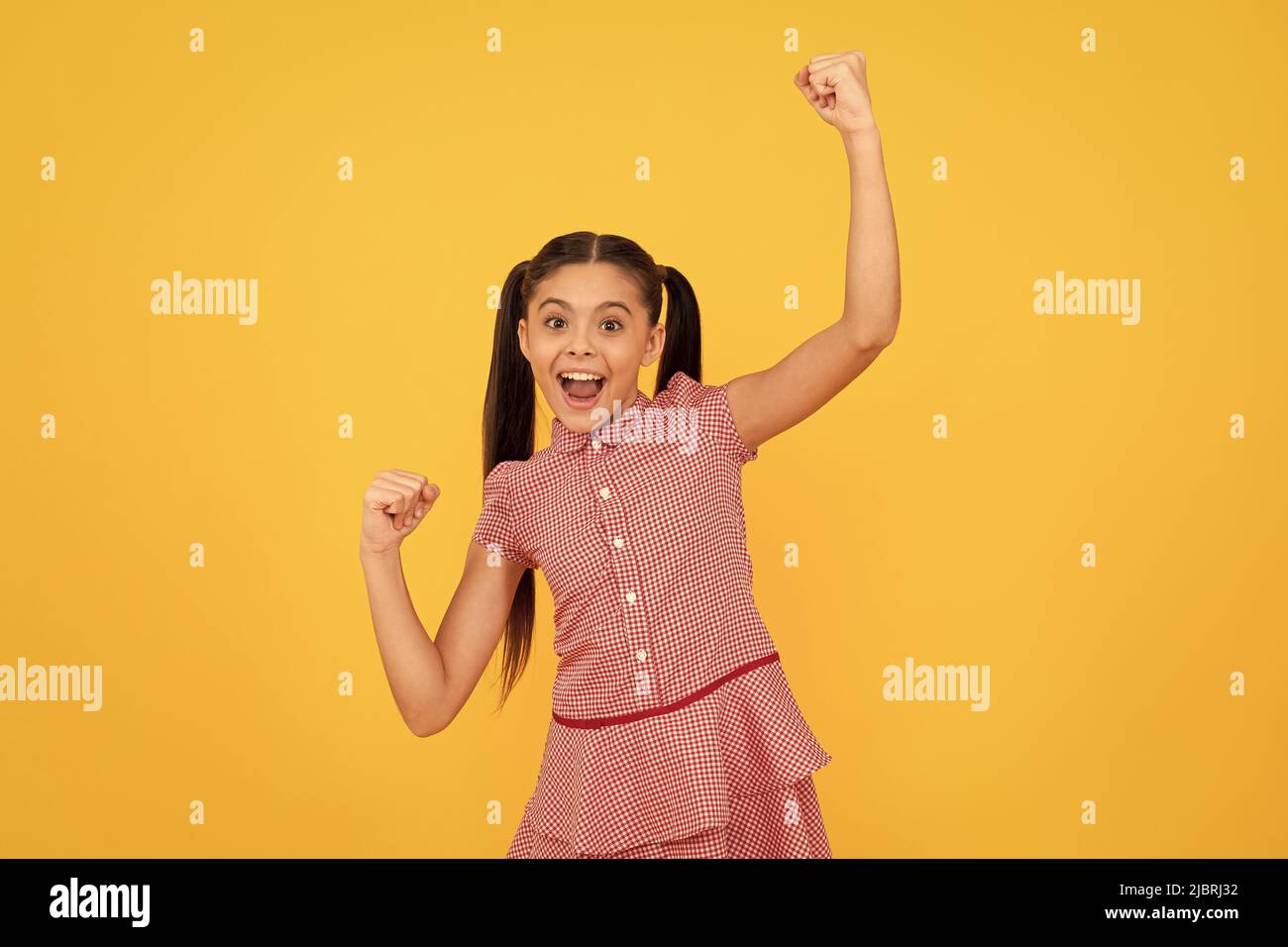 Feel like a winner. Lucky winner yellow background. Happy kid scream ...