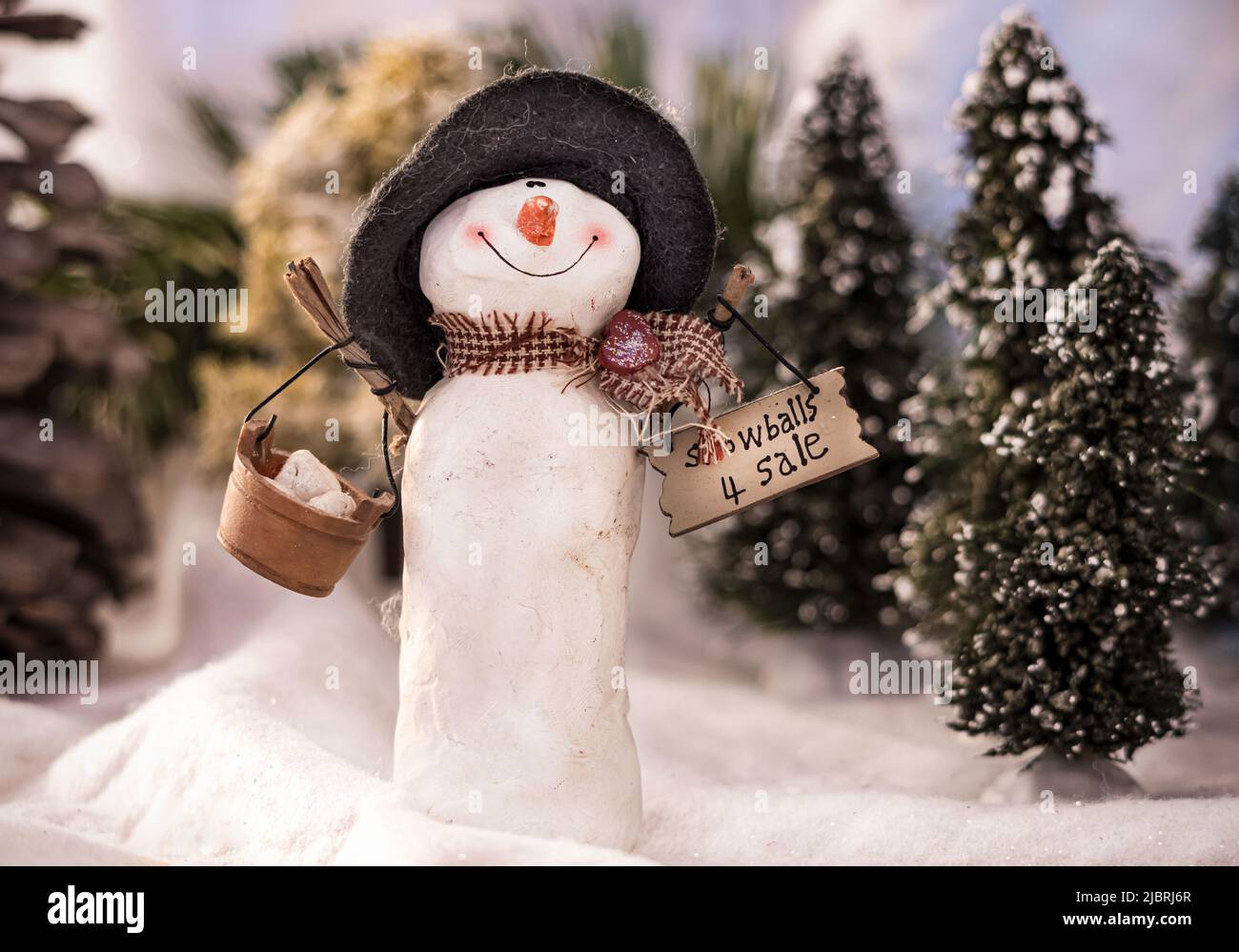 Snowman carrying snowballs hi-res stock photography and images - Alamy