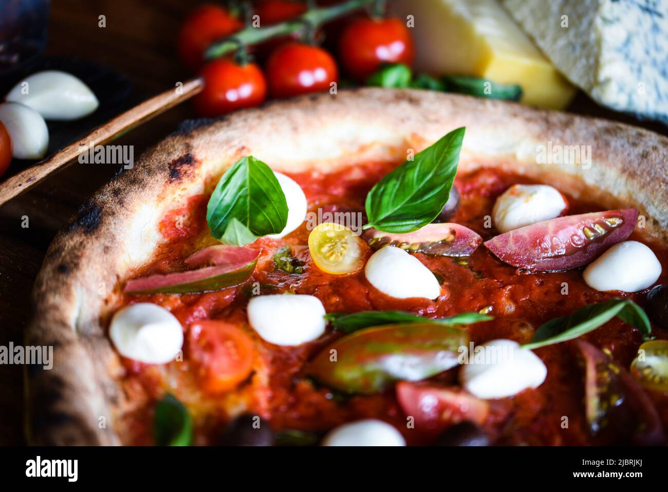 delicious Italian pizza with fresh ingredients Stock Photo - Alamy