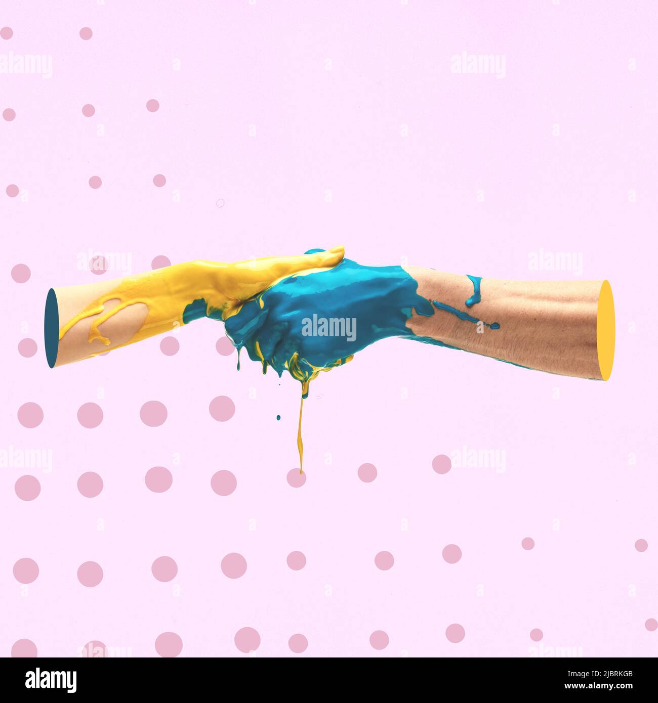 Blue and yellow painted human hands handshaking isolated on pink ...