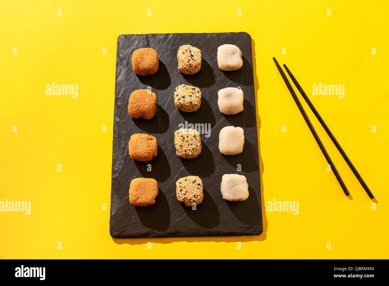 Japanese dessert packaged set on a yellow background. Japanese ice ...