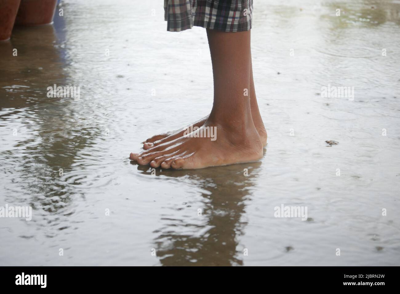Child jumping into water hi-res stock photography and images - Alamy