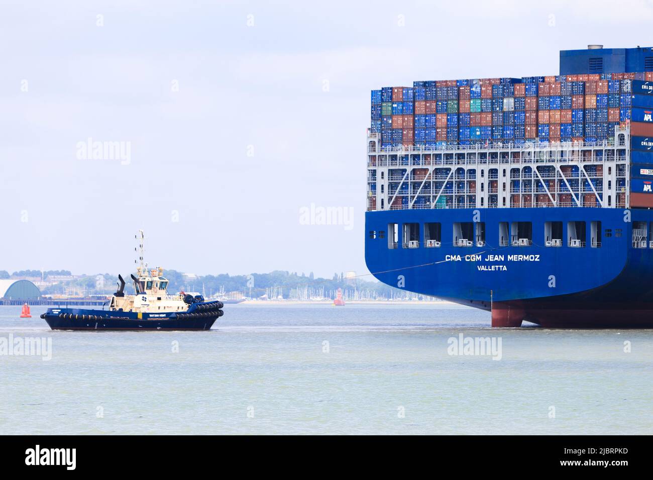 Tug boat Svitzer Kent at work assisting container ship CMA CGM Mermoz ...