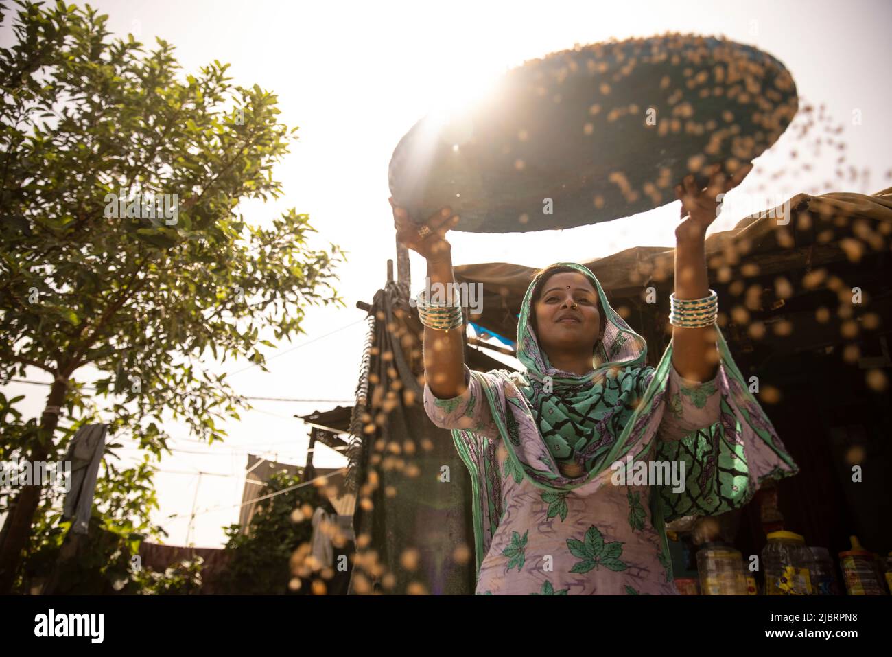 Wind winnowing of grain hi-res stock photography and images - Alamy