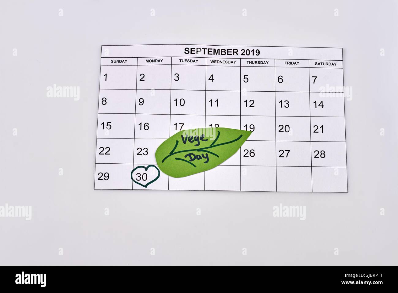 Paper calendar with marked 30 september isolated on white background ...