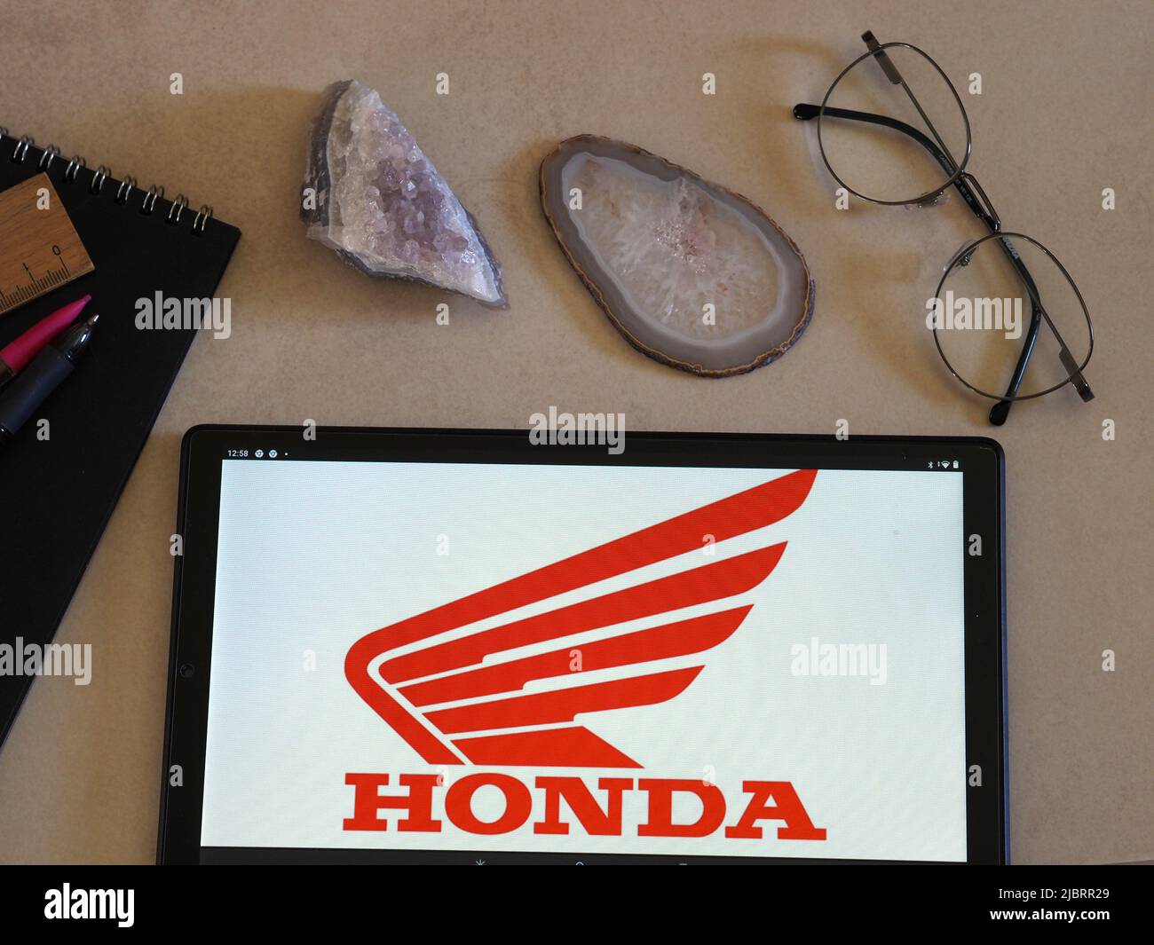 In this photo illustration Honda Motor Co., Ltd. logo seen displayed on ...