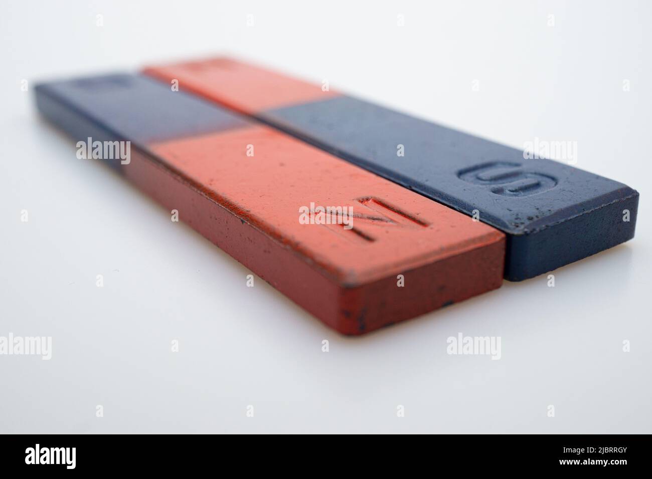 The bar magnet on a white background Stock Photo - Alamy