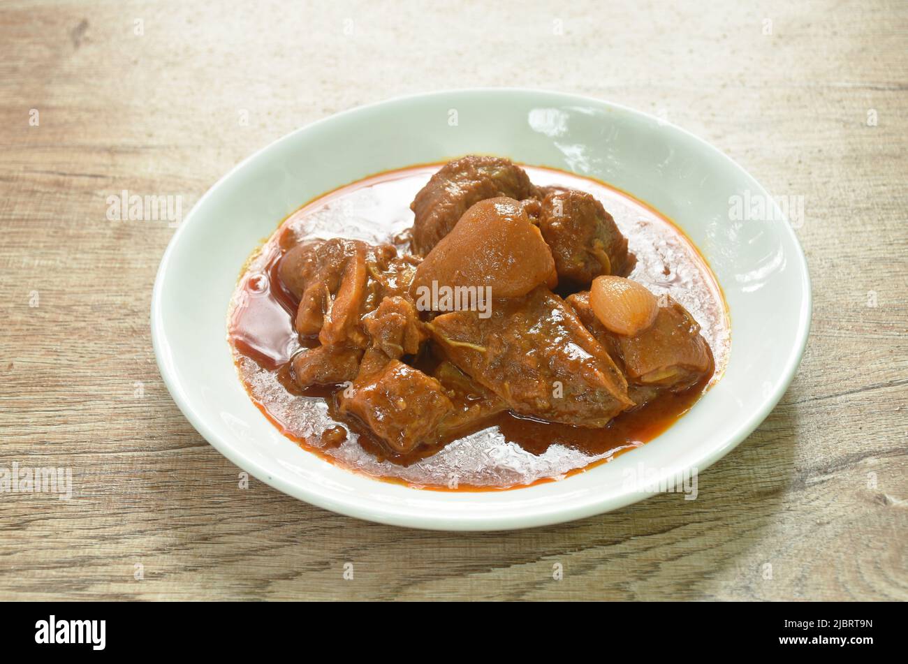 boiled spicy pork belly in curry soup or Hang leh Thai northern style ...