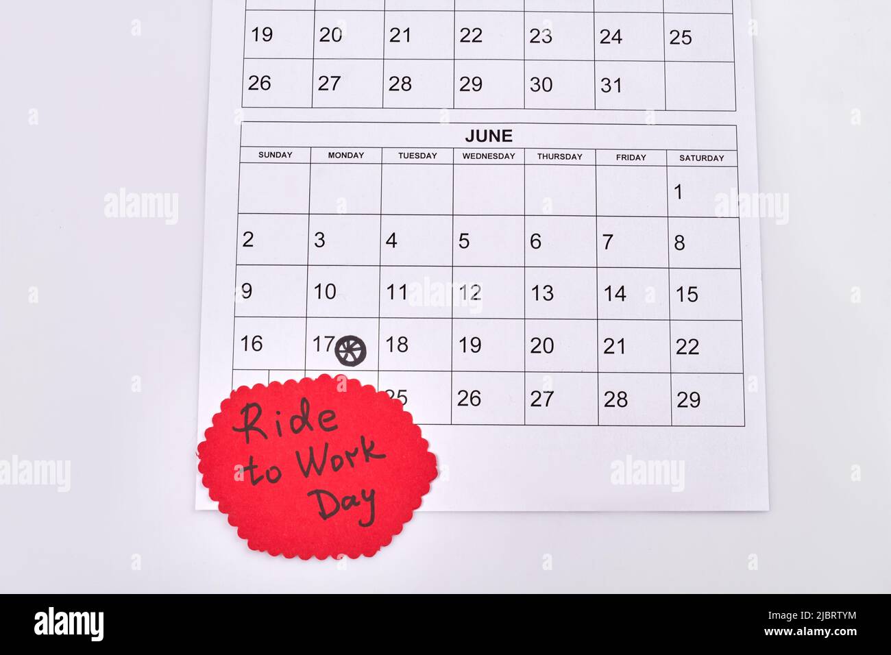 Ride to work day. Marked june 17 in the calendar. Isolated on white ...