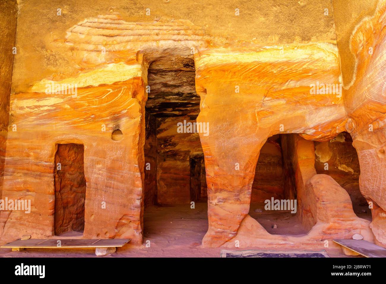 View of a building carved in the rock cliffs, in the ancient Nabatean ...