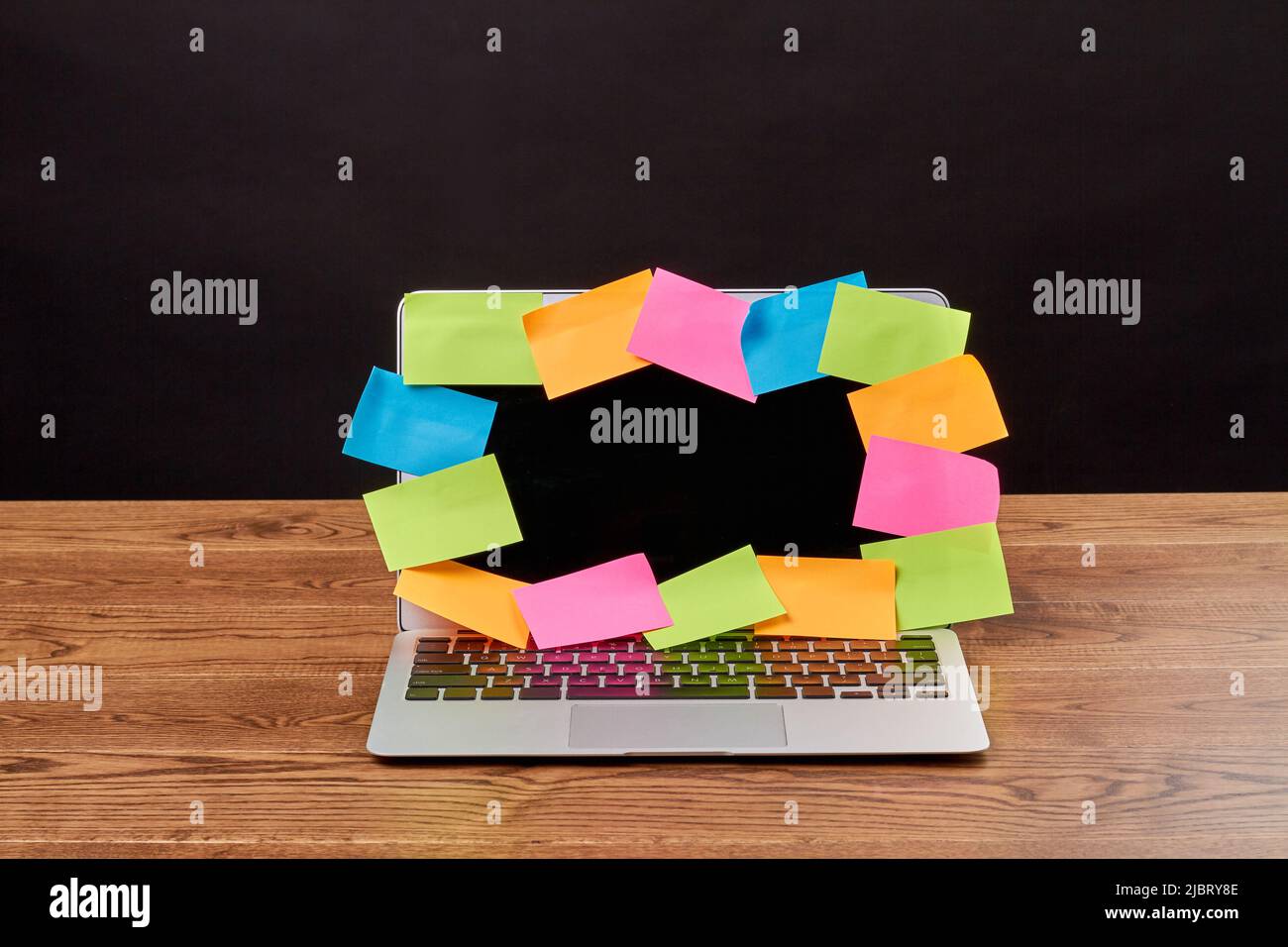 Open laptop with many colored sticker notes for copy space. Notebook on ...