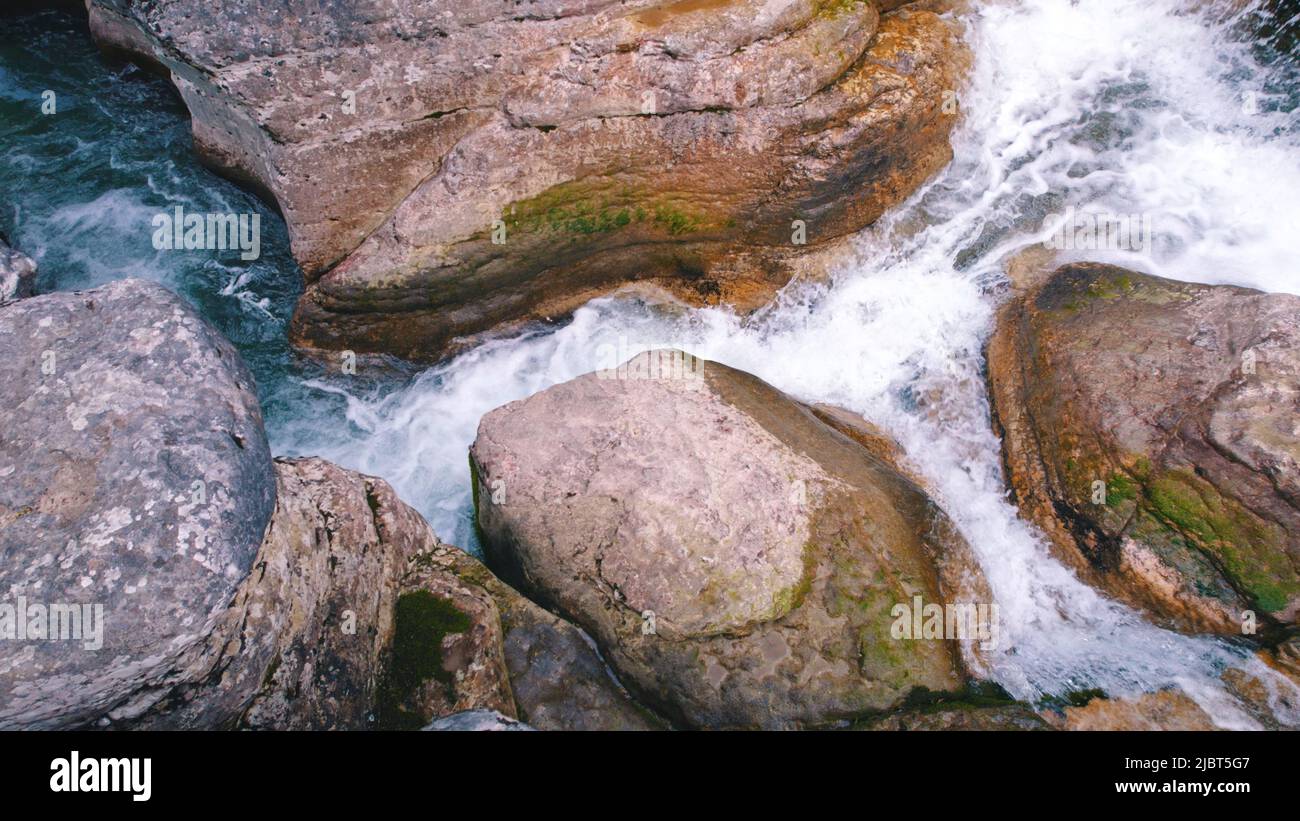 beautiful scenery of small Kinchka waterfall on the river Okatse. High ...