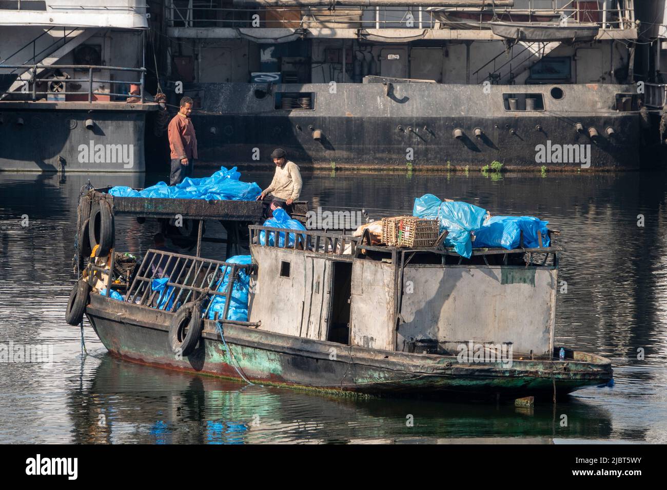 refuse collection from cruise boats, River Nile, Egypt Stock Photo - Alamy