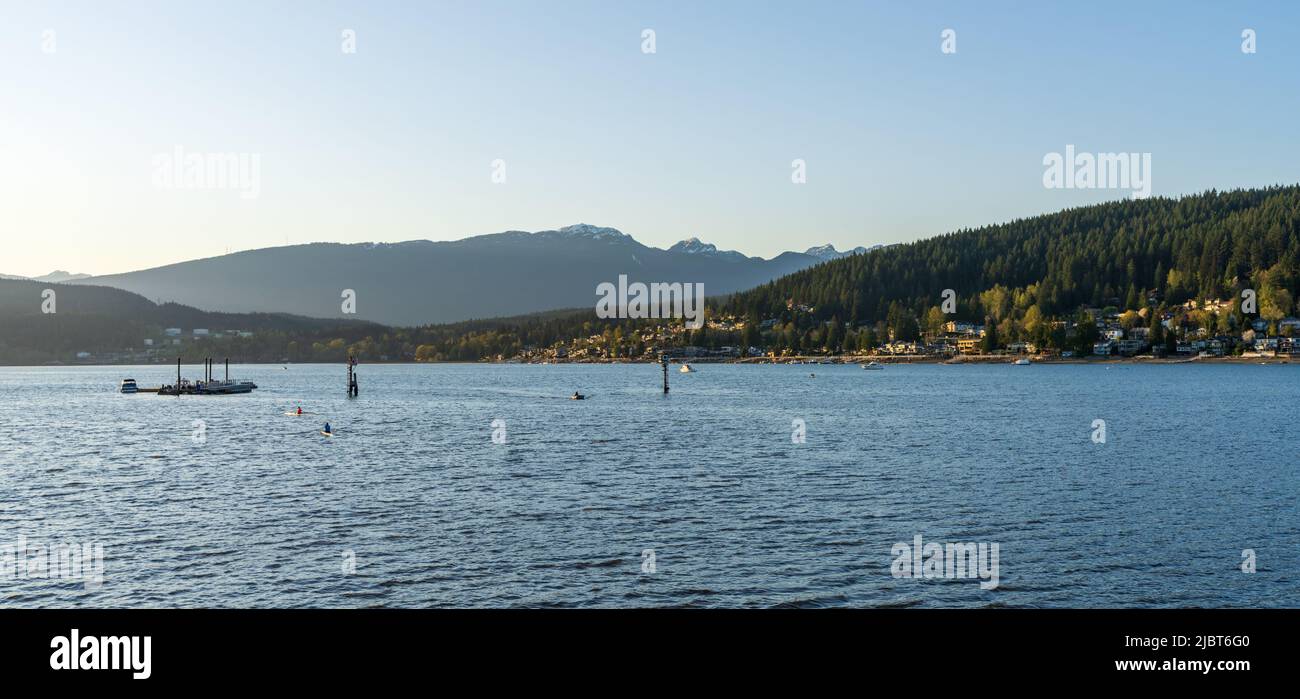 Burrard Inlet during sunset time. Rocky Point Park. Port Moody, British ...
