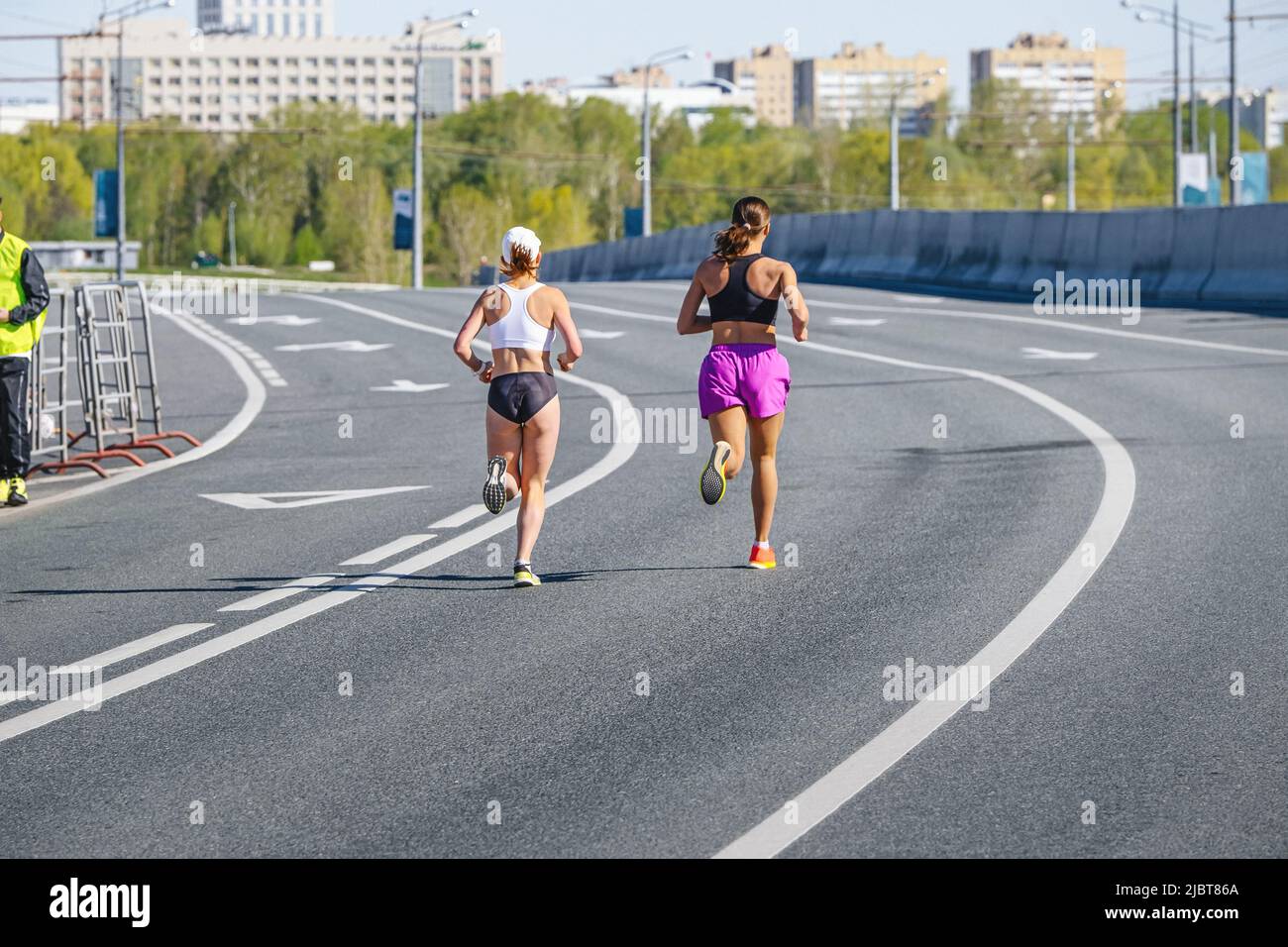 Female runner back hi-res stock photography and images - Alamy