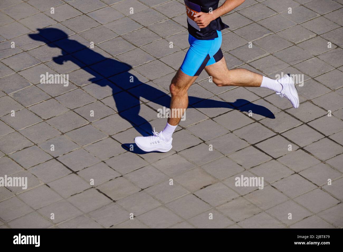 male athlete running marathon top view Stock Photo - Alamy