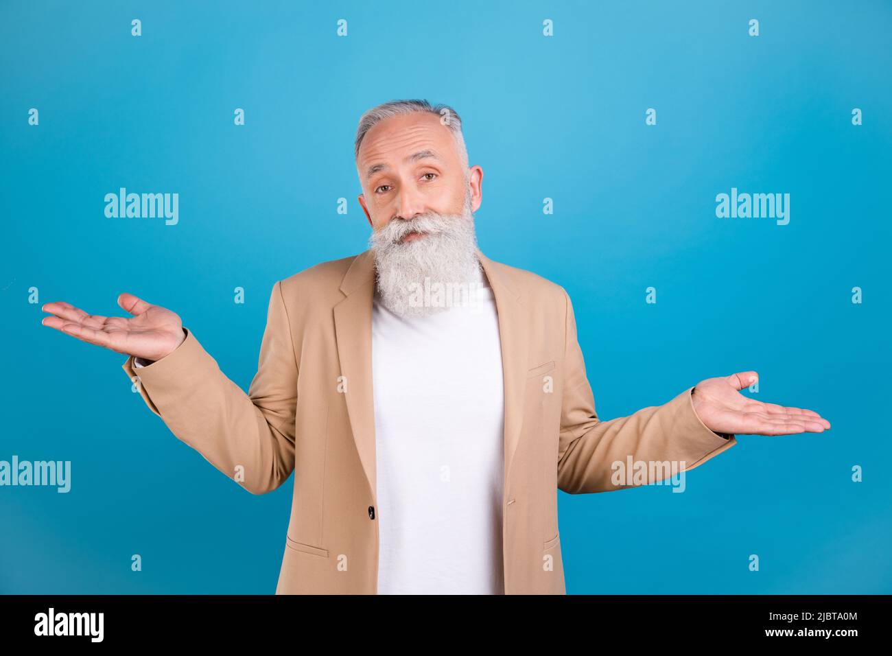 Portrait of attractive puzzled classy grey-haired man shrugging ...