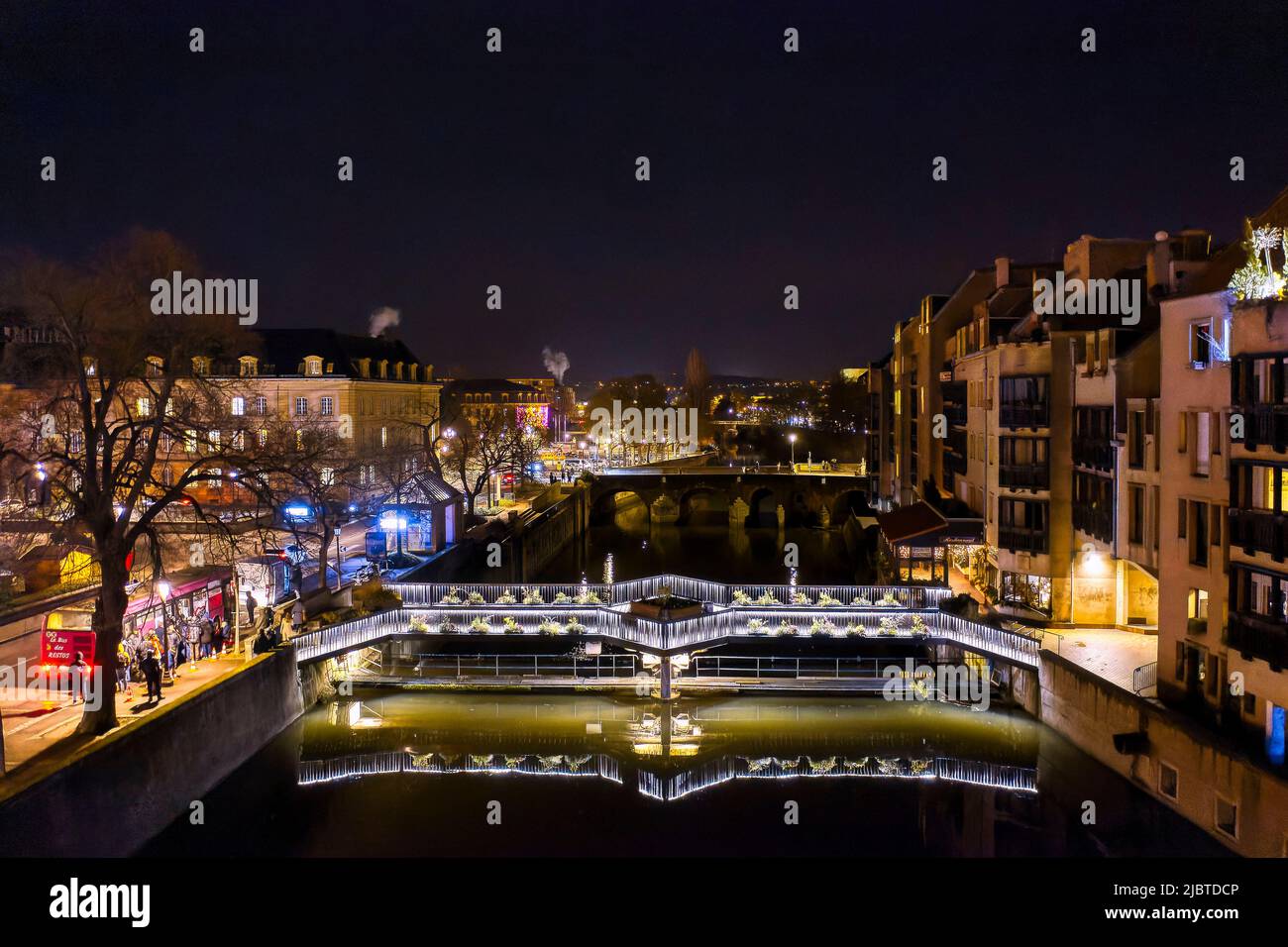 France, Moselle, Metz, the bridges of the Moselle illuminated (aerial ...