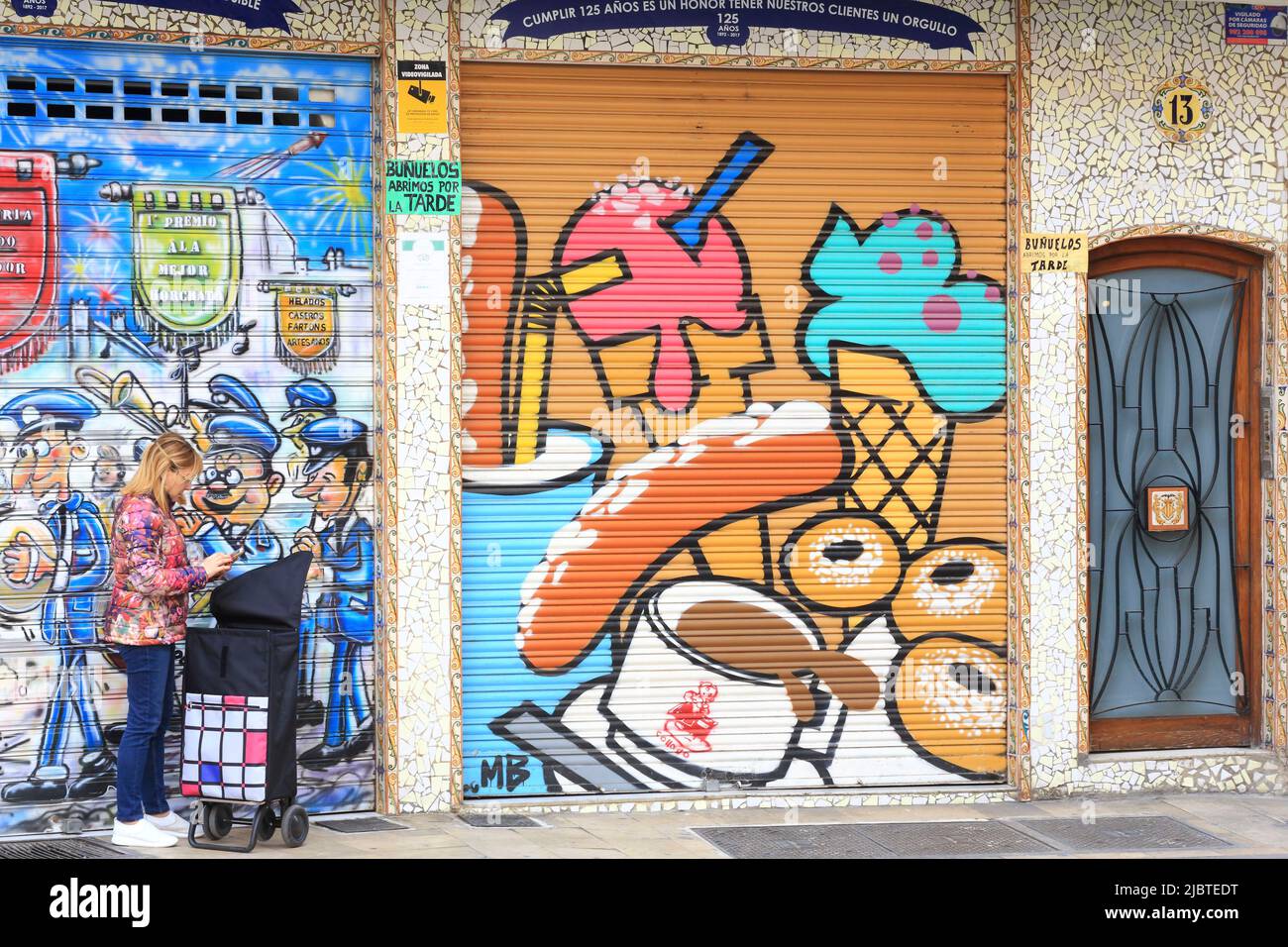 Spain, Valencia, Plaza Doctor Collado, street art on the iron curtain ...