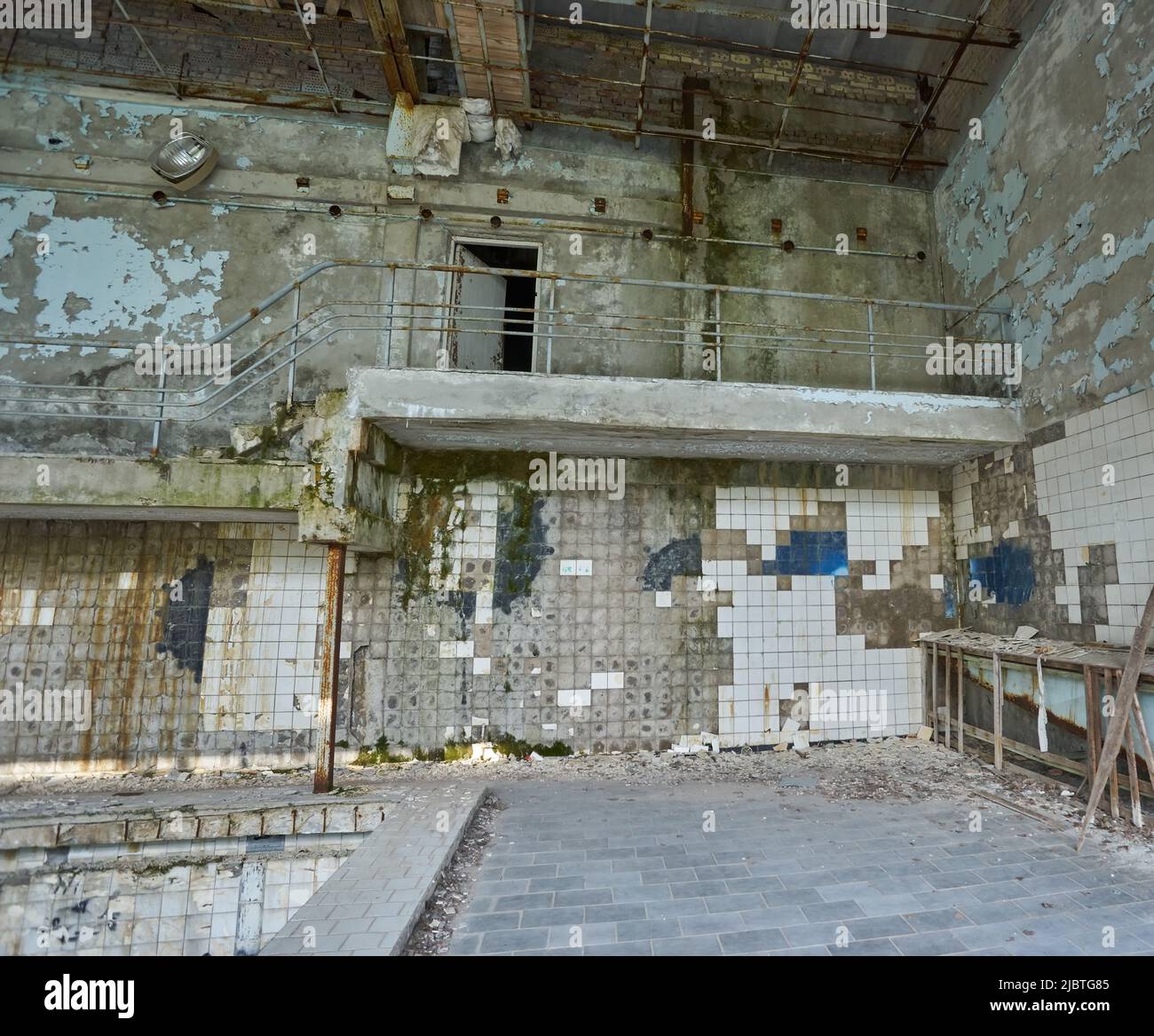 Abandoned swimming pool in Pripyat. Destroyed gym in a radioactive city ...