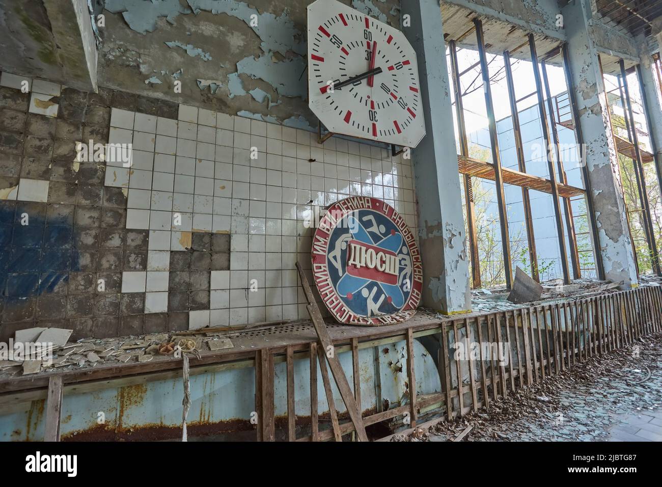 Abandoned swimming pool in Pripyat. Destroyed gym in a radioactive city ...