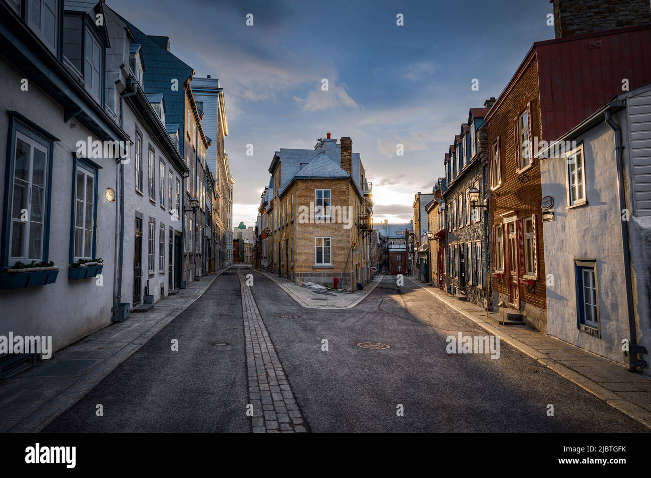 Beautiful intersection of two narrow alleys under the dusk, Quebec Old ...