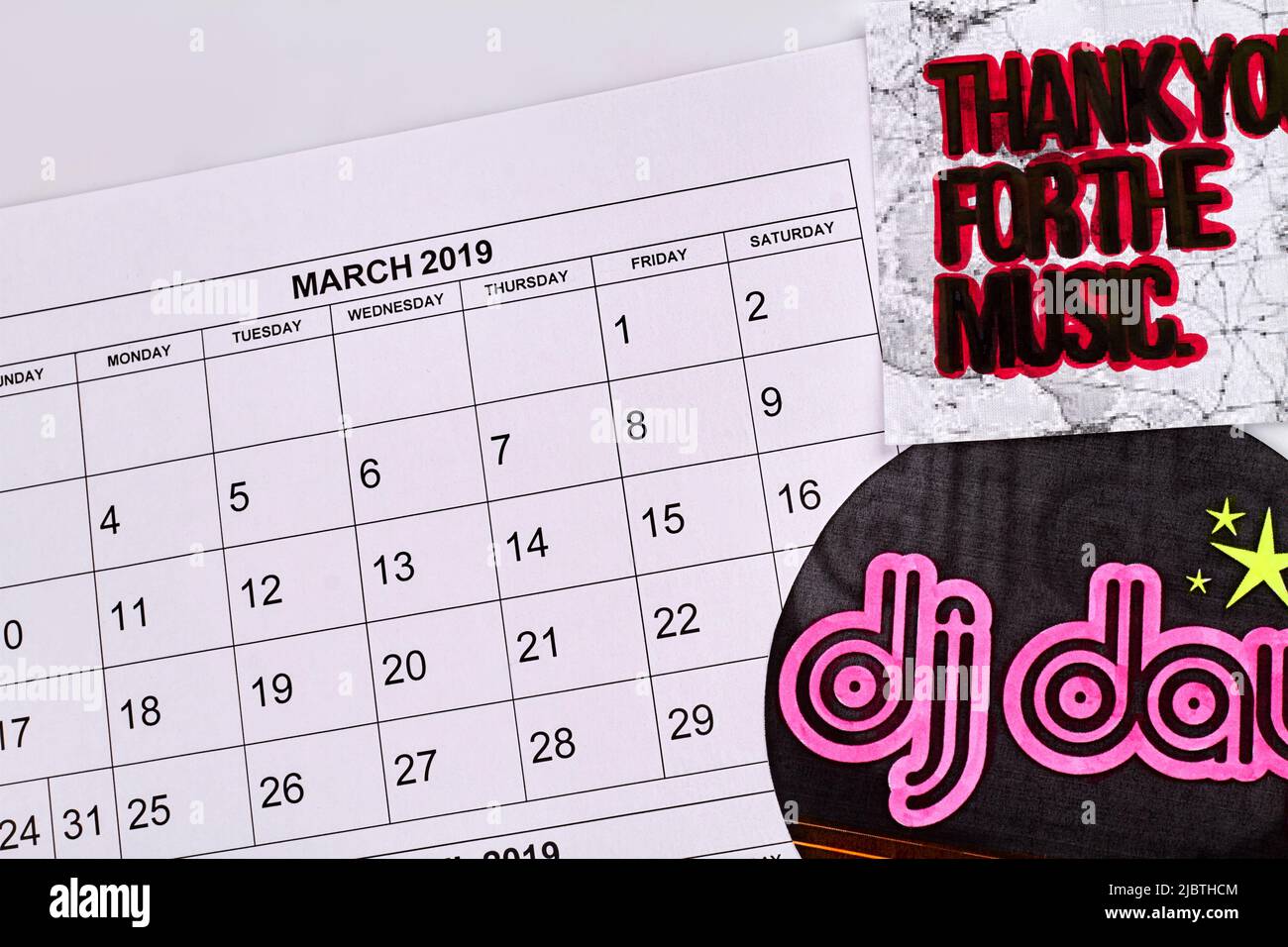 March calendar and round dj day label on white background. Thank you ...