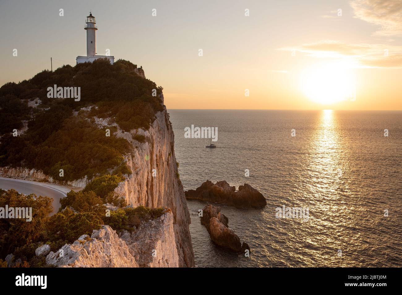 lefkada island lighthouse on the sunset Greece Stock Photo - Alamy