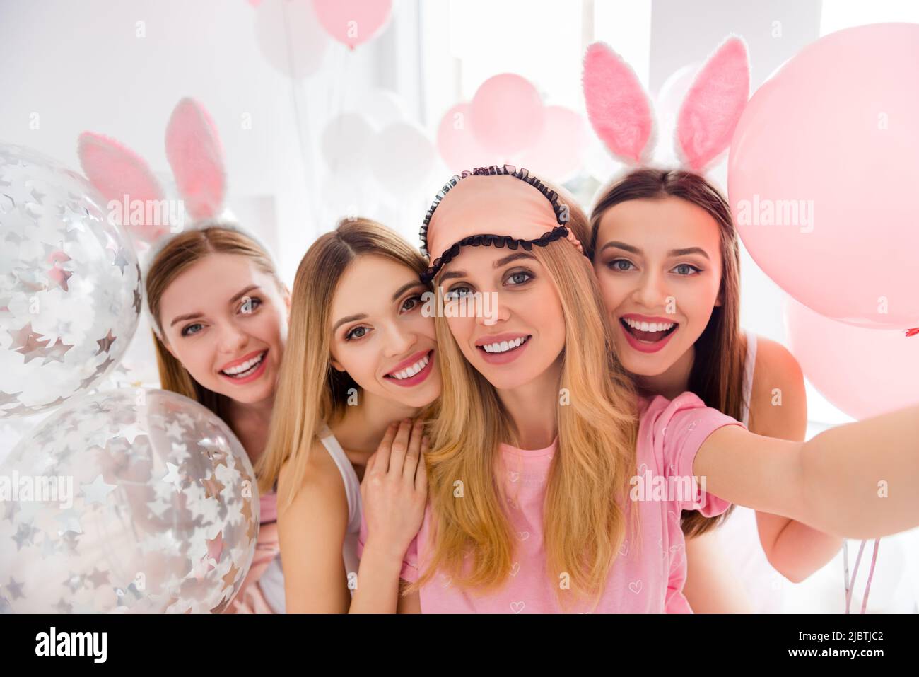 Photo of four charming positive ladies make selfie record video light ...