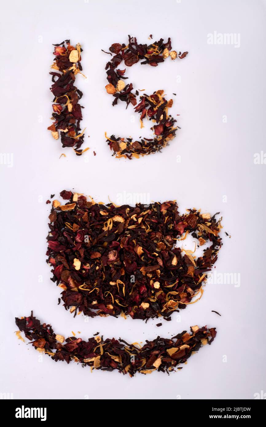 Tea day concept. 15 number and cup shapes on white background. Top view ...