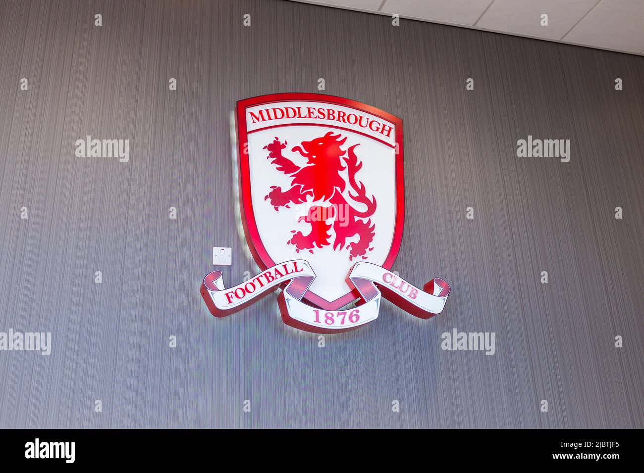 The illuminated club crest on the wall in reception at the Riverside ...