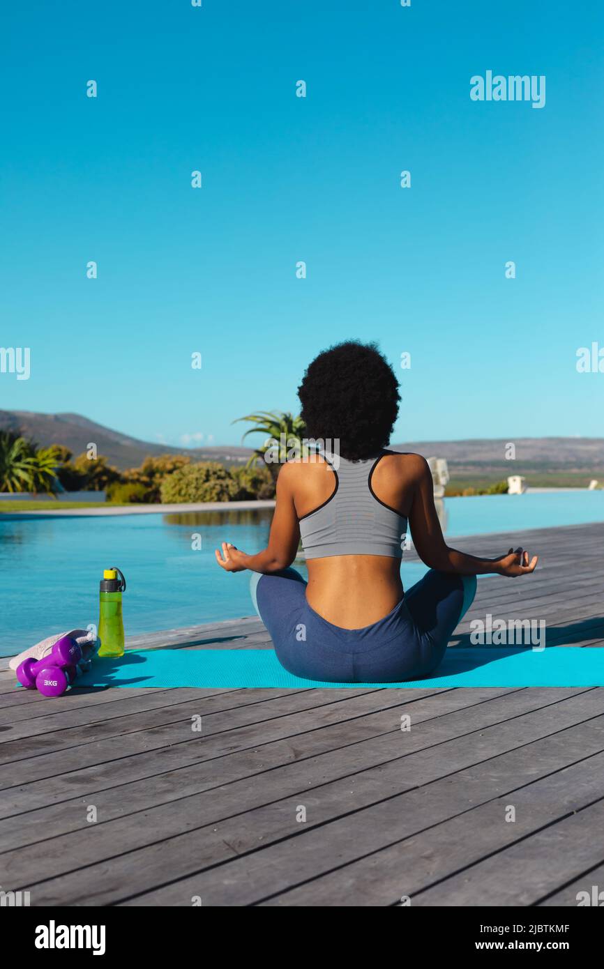 Meditating african woman hi-res stock photography and images - Alamy